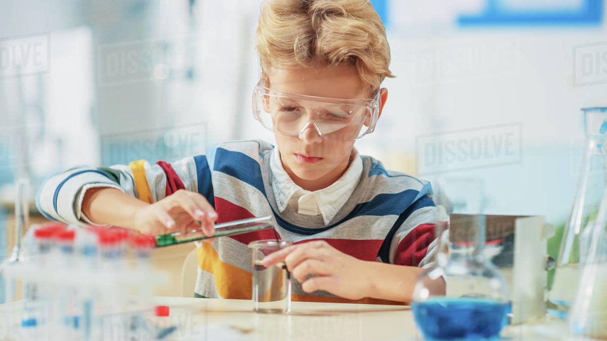 Elementary School Science or Chemistry Classroom: Smart Little Boy ...