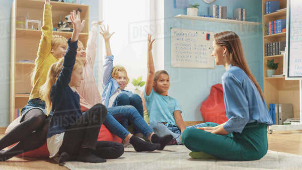 Elementary School Creativity Class: Diverse Children Sitting on Carpet ...