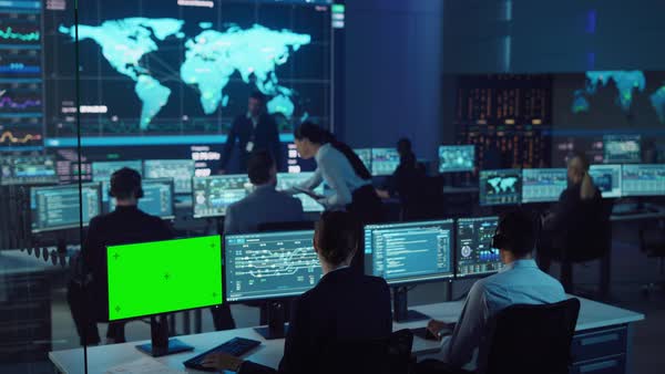 Team of Professional Computer Data Science Engineers Work on Desktops ...