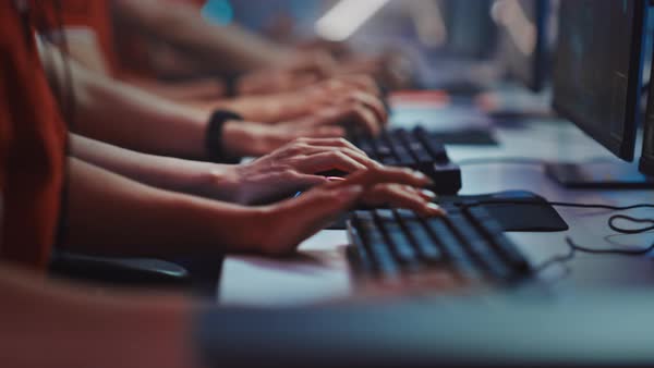 Diverse Esport Team of Pro Gamers Playing in Video Game on a ...