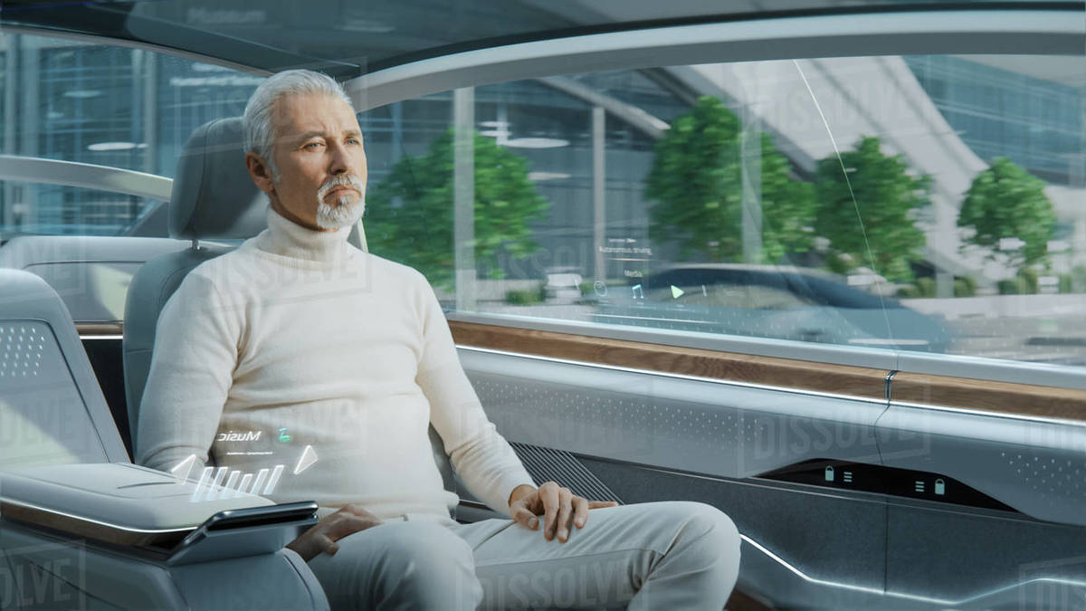 Attractive Senior Man in White Clothes is Chilling and Sitting on a ...