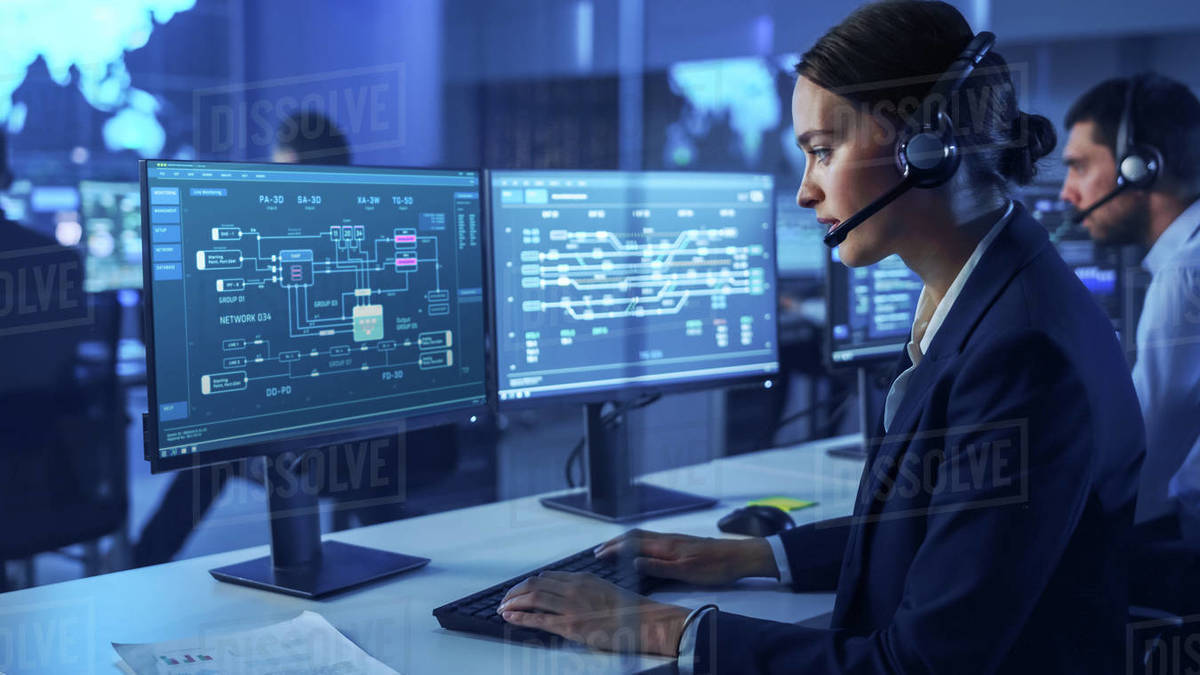 Confident Female Data Scientist Works on Personal Computer Wearing a ...