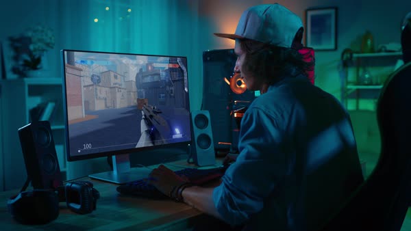 Professional eSports Gamer Plays 3D Shooter Mock-up Video Game with ...