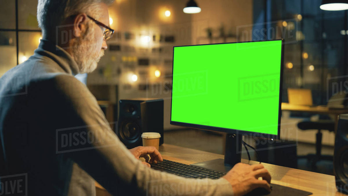 Creative Middle Aged Designer Sitting at His Desk Uses Desktop Computer ...