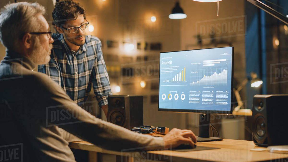 Professional Senior Business Martket Analyst Works on Desktop Computer ...