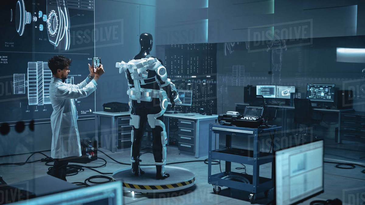 In Robotics Development Laboratory: Engineer Uses Digital Tablet ...