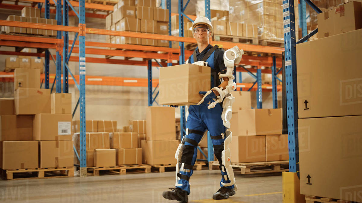 High-Tech Futuristic Warehouse: Worker Wearing Advanced Full Body ...