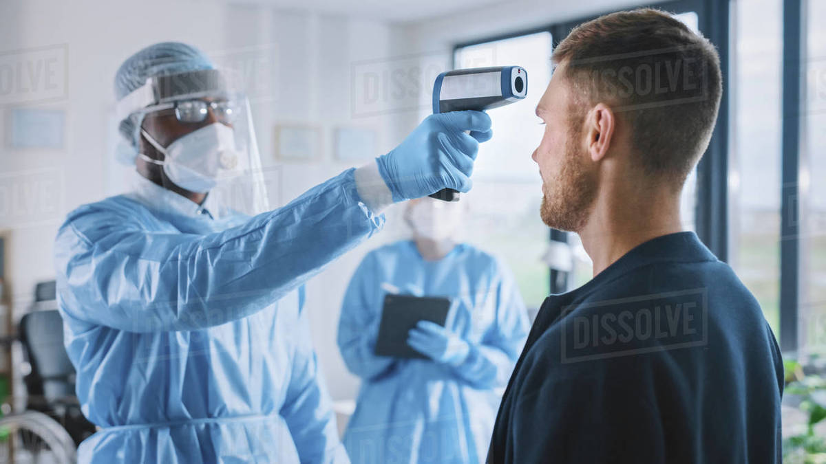 Close Up of a Medical Nurse Measuring Patient's Body Temperature ...