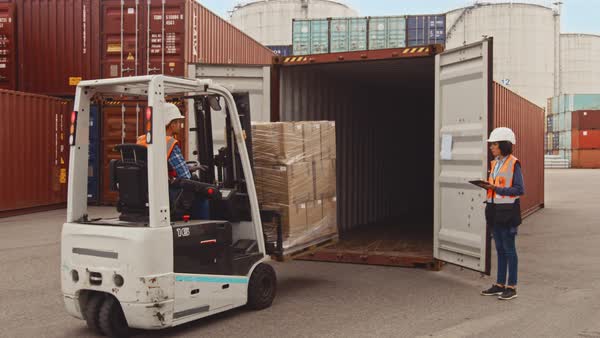 Forklift Driver Loading a Shipping Cargo Container - 4K Royalty-free ...