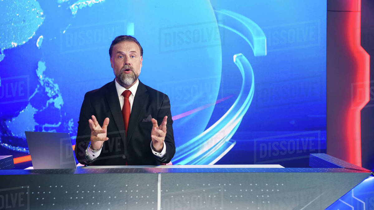 Live News Studio with Professional Anchor doing Report - Royalty-free ...