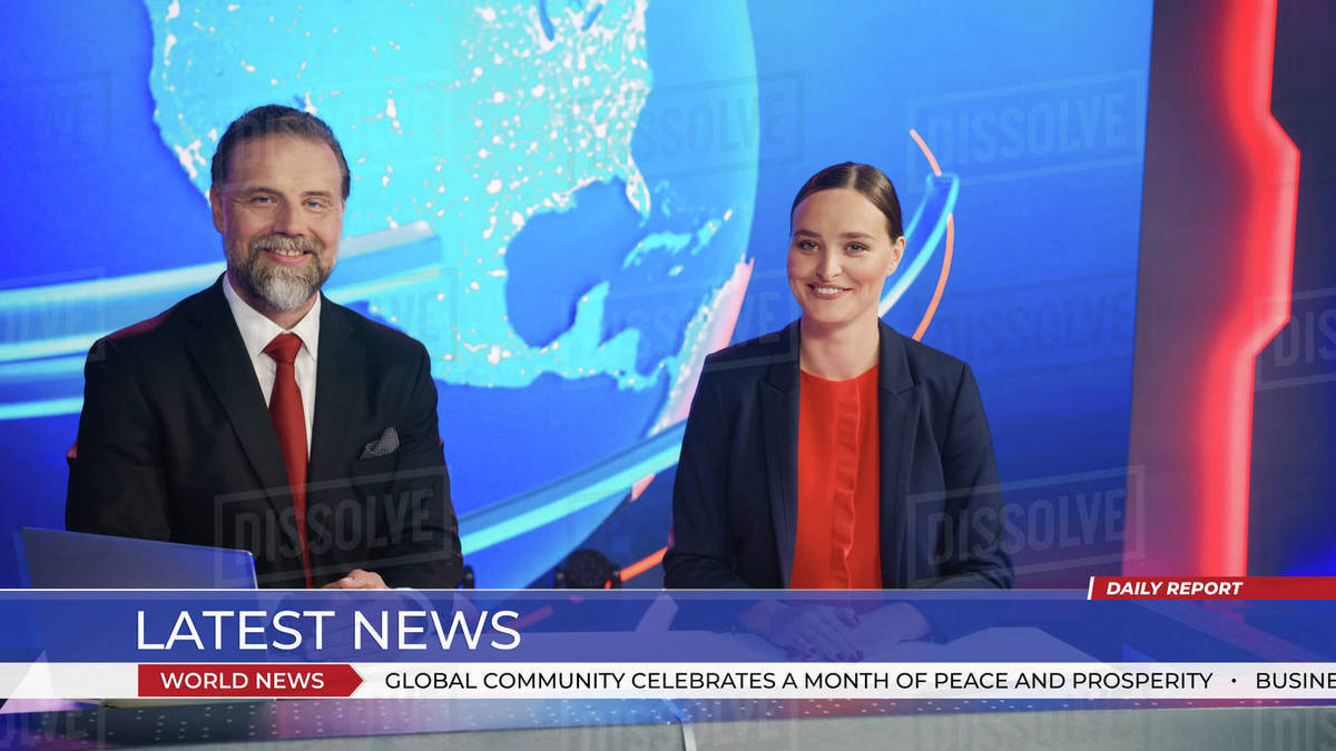 Live News Studio with Professional Anchors doing Report - Stock Photo ...