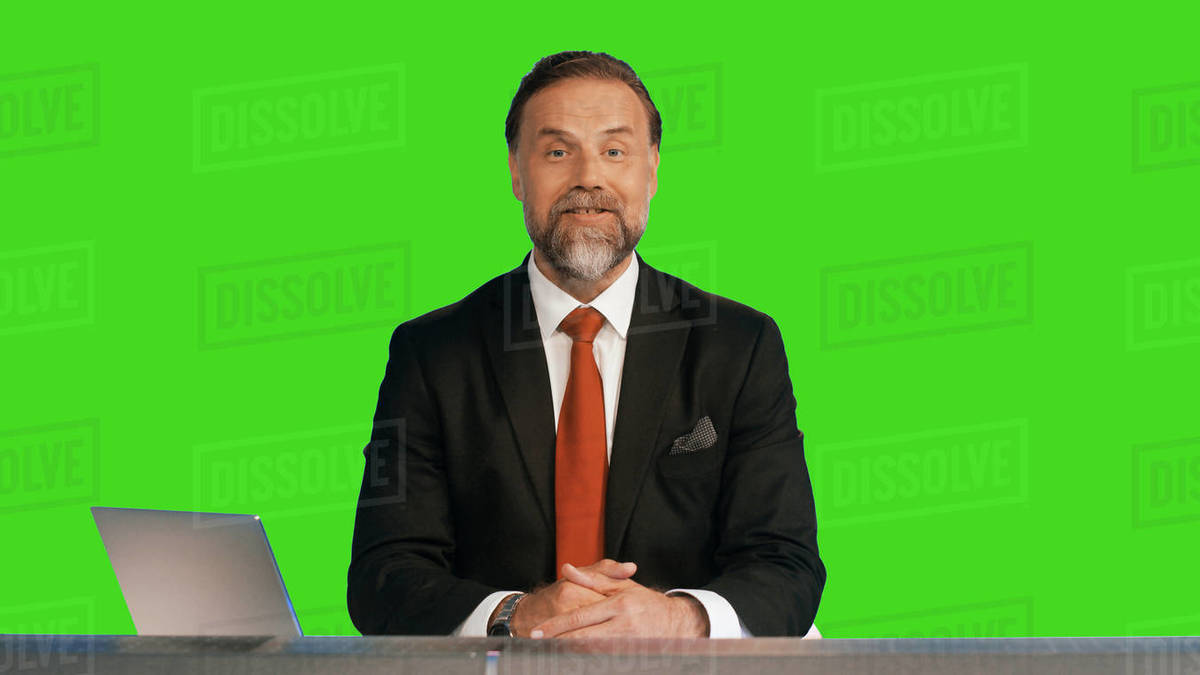 Live News Studio with Professional Anchor doing Report on Green Screen ...