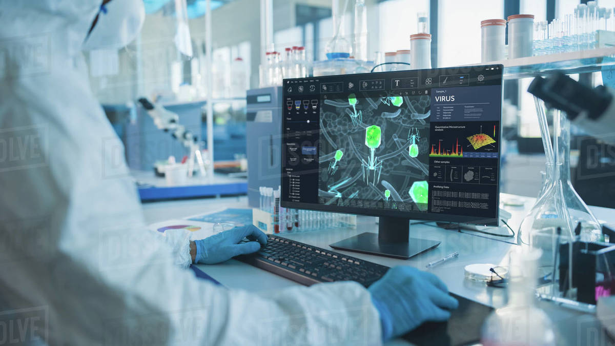 Medical Scientist Working on Personal Computer Developing Vaccine ...