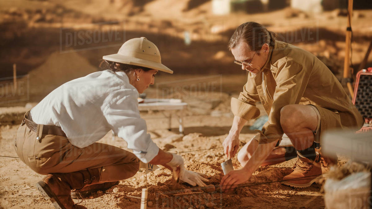 Two Archeologists Work on Excavation Site - Royalty-free Stock Photo ...