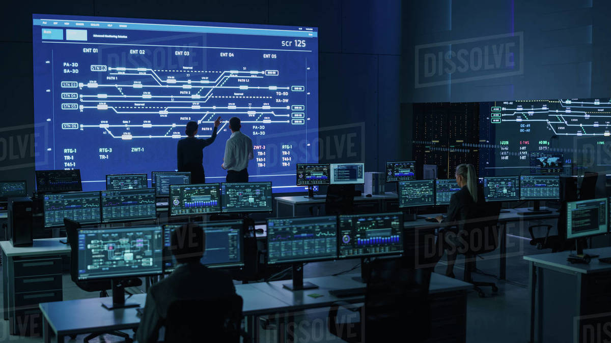 Project Manager and Computer Science Engineer Talking while Using Big Screen Display - Royalty ...