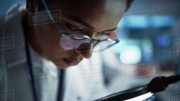 Black Female Engineer Does Computer Motherboard Soldering - Royalty ...