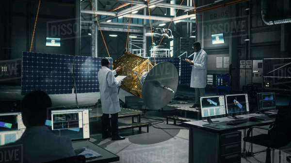 Team of Engineers Working on Satellite Construction. Aerospace Agency ...