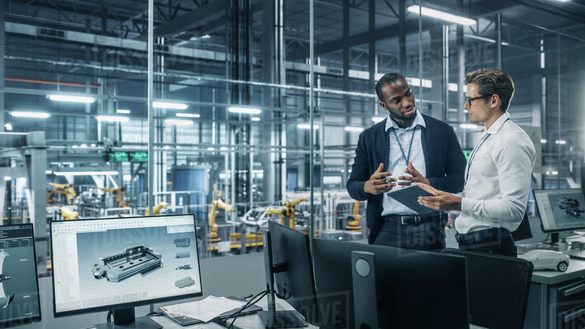 Two Diverse Automotive Industrial Engineers Talking About Vehicle ...