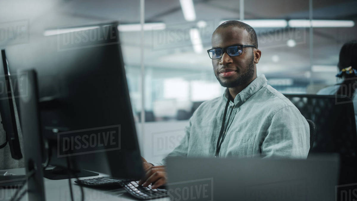 Real Office: Professional Black IT Programmer Working on Desktop ...