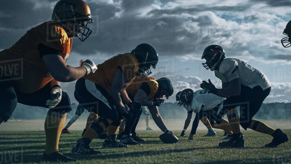 Two Professional American Football Teams Stand Opposite Each Other ...