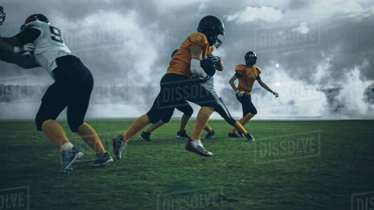 American Football Field Two Teams Play - Stock Photo - Dissolve