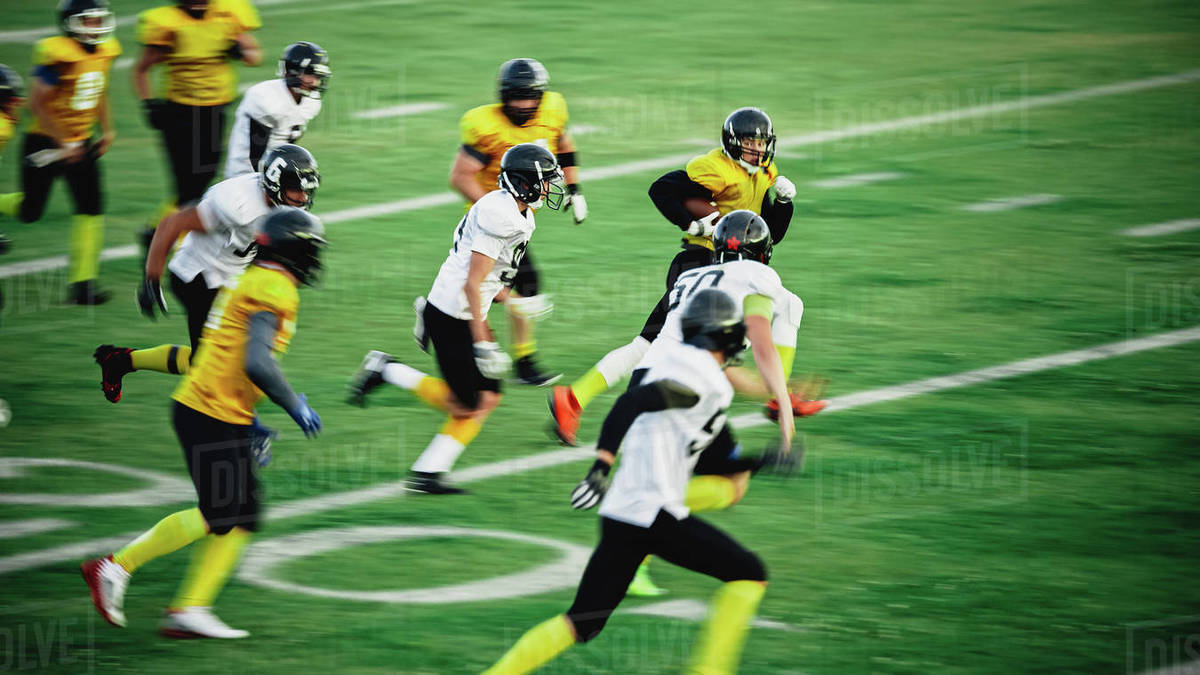 American Football Teams Start Game - Royalty-free Stock Photo | Dissolve