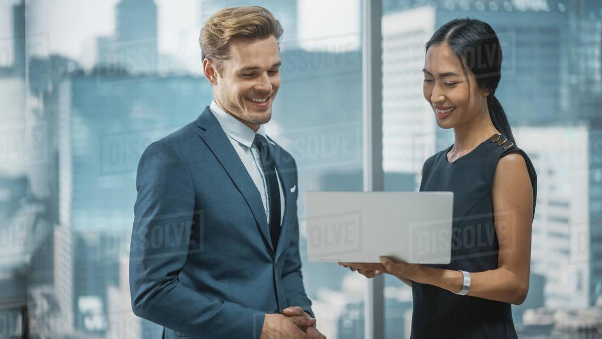 Two Adult Professionals Talking About Business - Royalty-free Stock ...