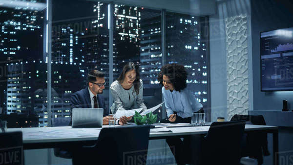 Diverse Team of Top Managers Talk - Stock Photo - Dissolve