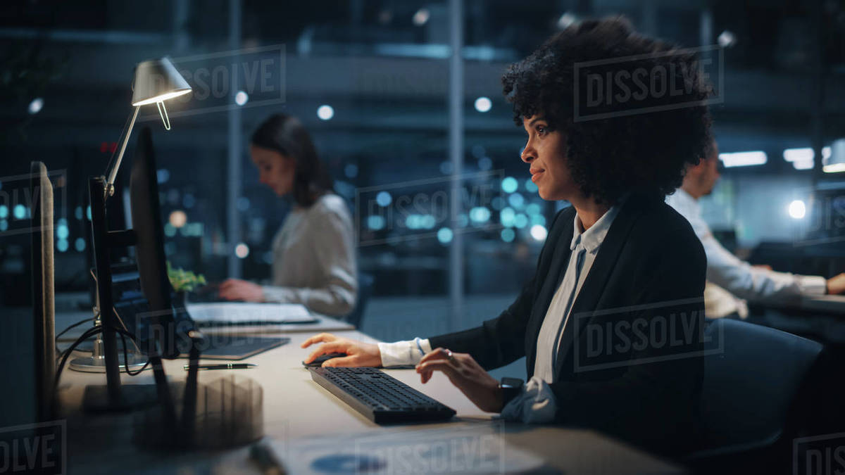 Portrait of African American Female Manager Using Computer - Royalty ...
