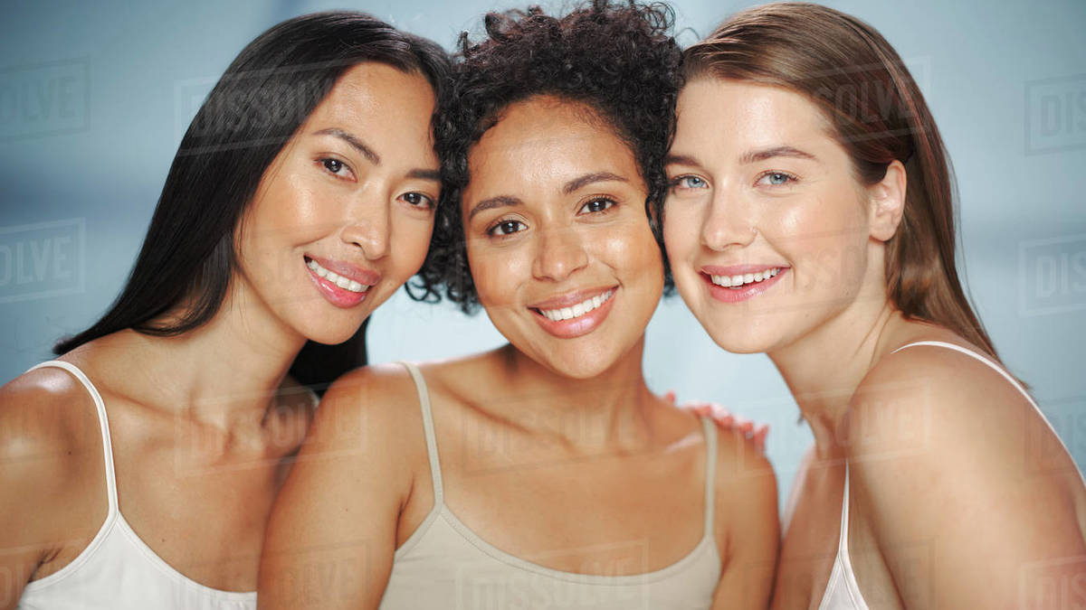 Portrait of Three Diverse Multiethnic Models - Stock Photo - Dissolve