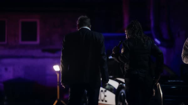 Forensics Team, Police and Paramedics Working in a Crime Scene at Night ...