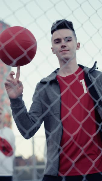 Vertical Screen: Portrait of a Handsome Young Football Player Looking ...