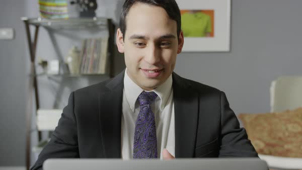 Close up of man on video chat interview in suit and underwear - 4K ...