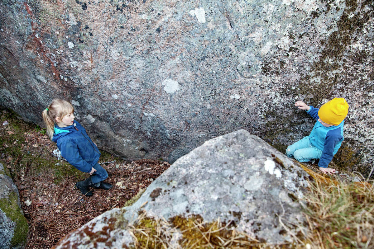 Girls on rocks - Stock Photo - Dissolve