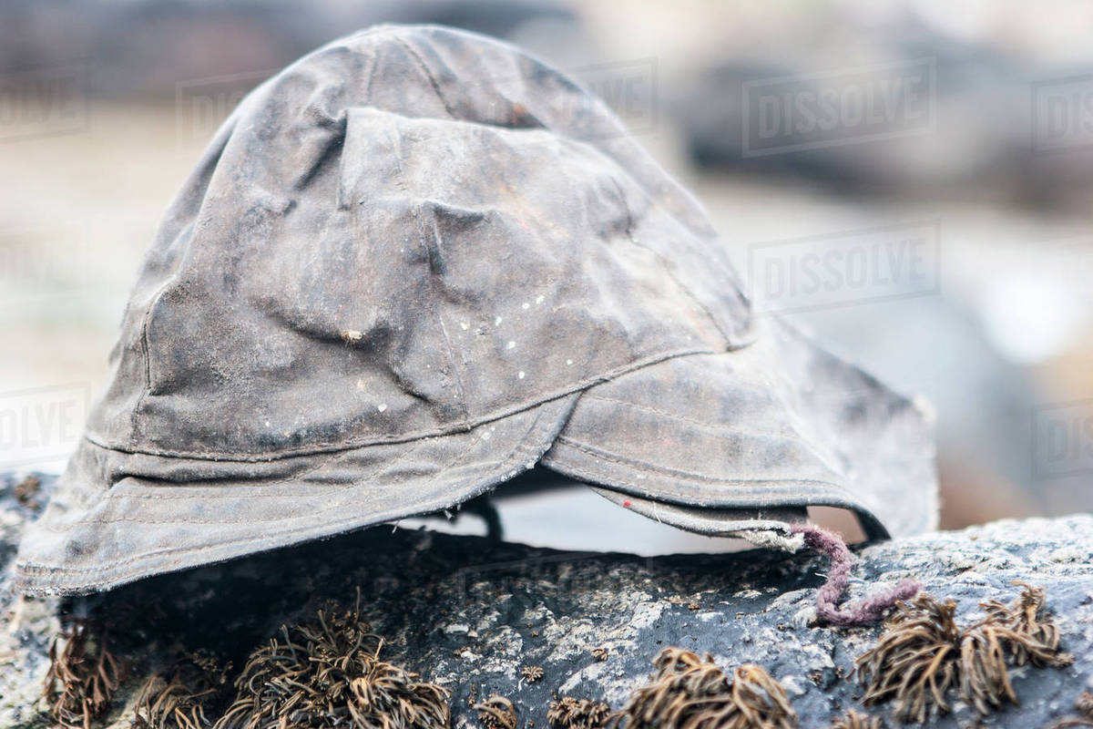 Hat on rock - Stock Photo - Dissolve