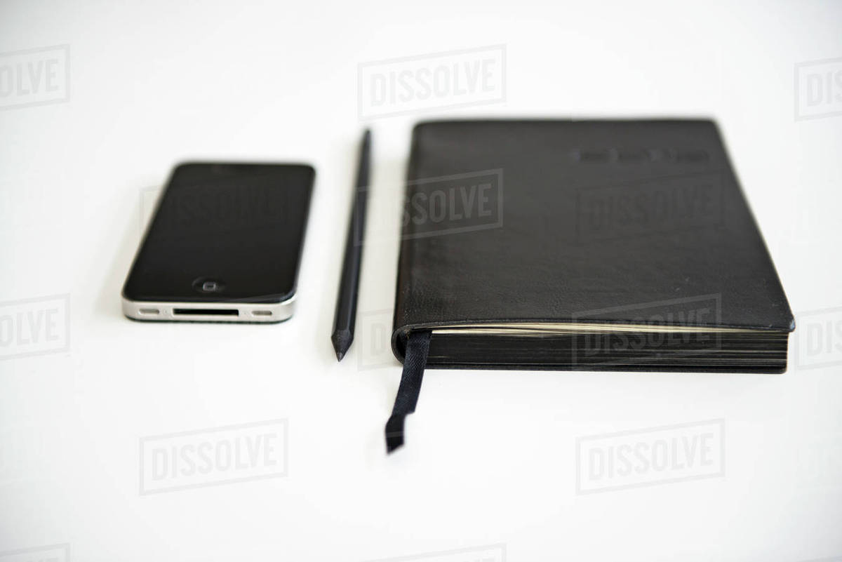 Diary and cell phone - Royalty-free Stock Photo | Dissolve