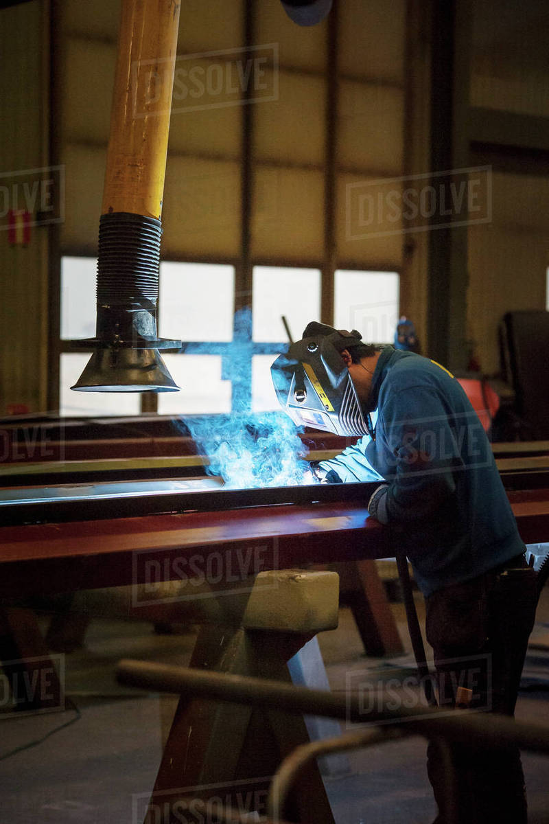 Man welding - Stock Photo - Dissolve