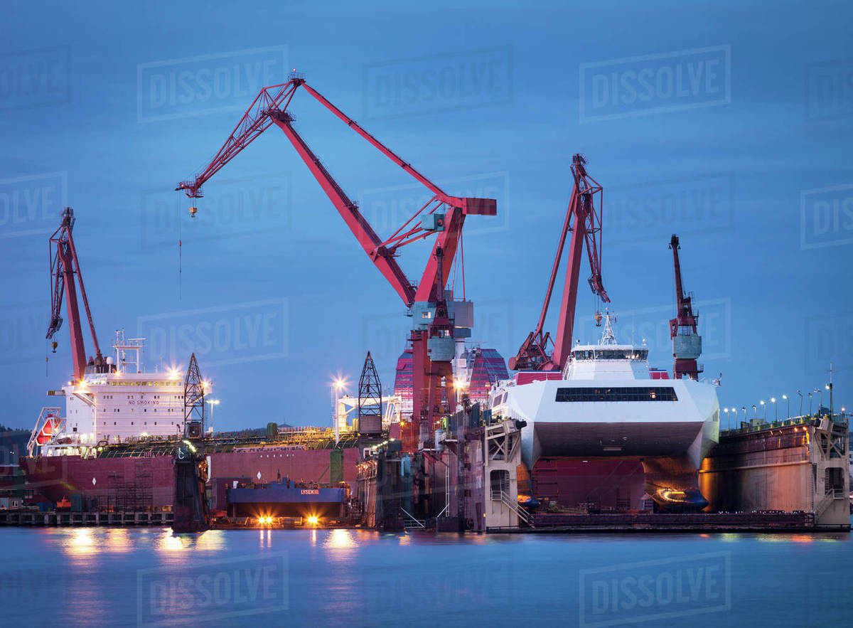 Shipping cranes in port - Royalty-free Stock Photo | Dissolve