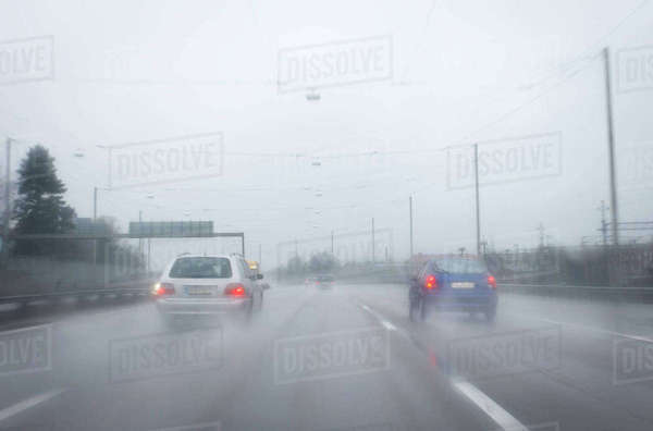 Traffic at rain - Stock Photo - Dissolve