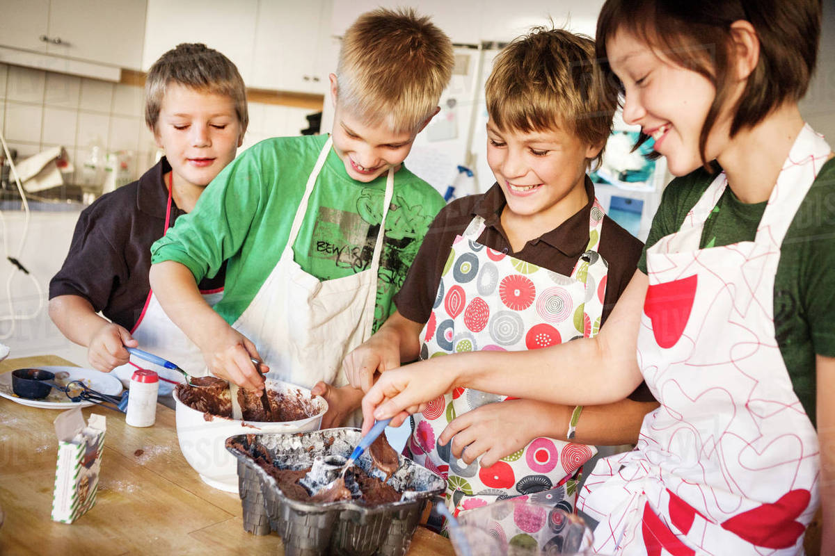 Children baking - Royalty-free Stock Photo | Dissolve