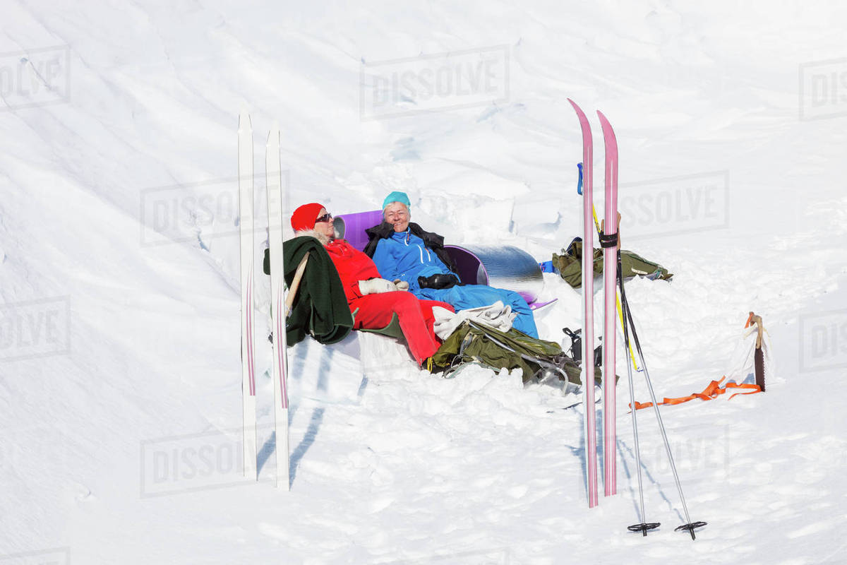 Women enjoying sun at winter - Royalty-free Stock Photo | Dissolve