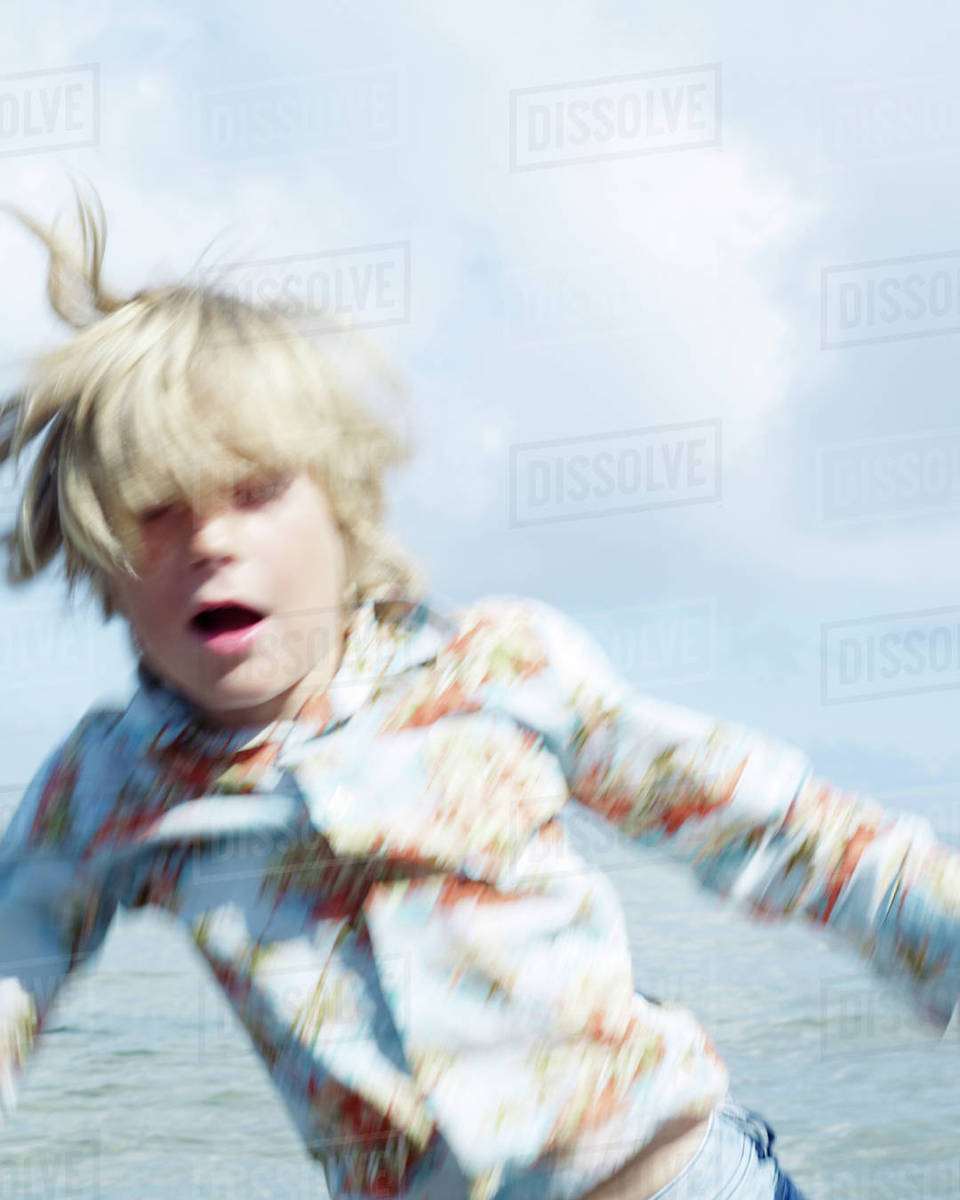 Boy, blurred motion - Royalty-free Stock Photo | Dissolve