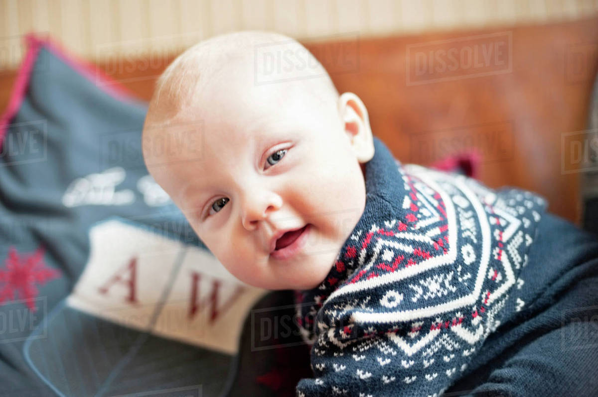 Smiling baby looking at camera - Royalty-free Stock Photo | Dissolve