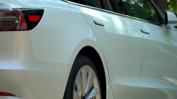 RALEIGH, USA, JULY 03, 2018: A brand new white Tesla Model 3. The model ...
