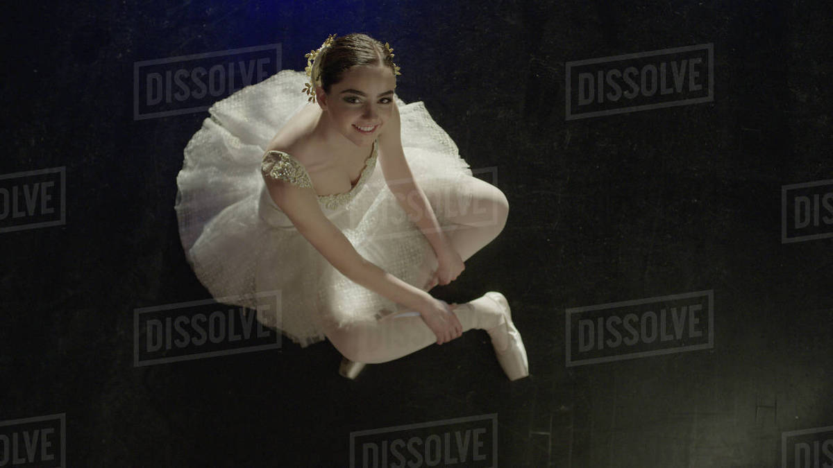 Overhead portrait of smiling ballet dancer wearing costume - Royalty ...