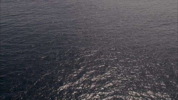 Ocean Sea Water Waves. The shot gives a sweeping look over the ocean ...