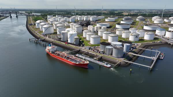 Crude Oil Liquid Cargo Transporter Ship Unloading Petrochemicals to a ...