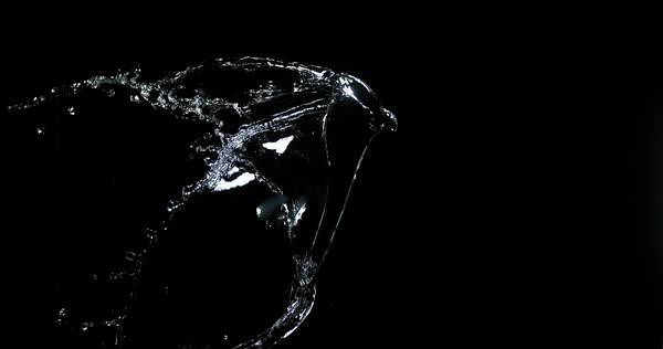 Water spurting out against black background - Stock Video Footage ...