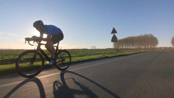Cyclist on bike, tracking shot from camera car - Stock Video Footage ...