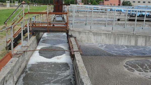 Aeration basin bubbling atwaste water treatment facility. - Stock Video ...
